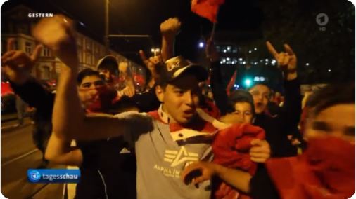 Turkish migrants hold victory parades for Erdogan across Germany